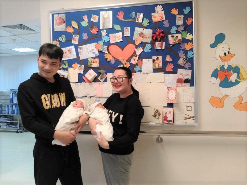 The 27-week-old twins finally made it back to their mother's side after ...